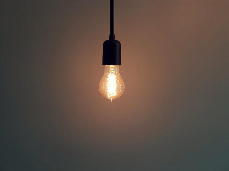 Light Bulb Flashing When Switched Off (Causes and Fixes)